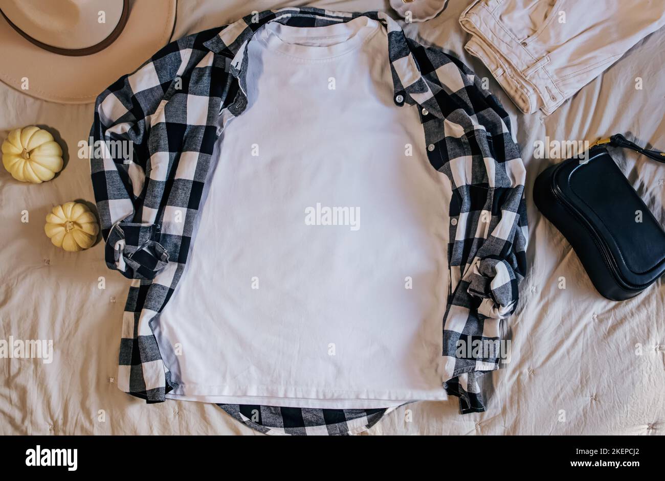 Styled Flat lay with feminine clothes and accessories. White t-shirt ...