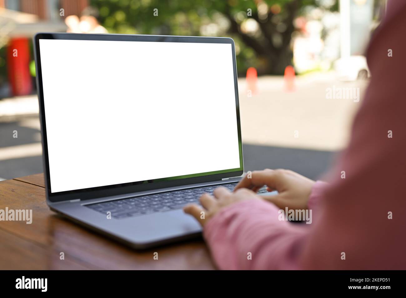 Asian female freelancer remote working at the cafe, working on her ...