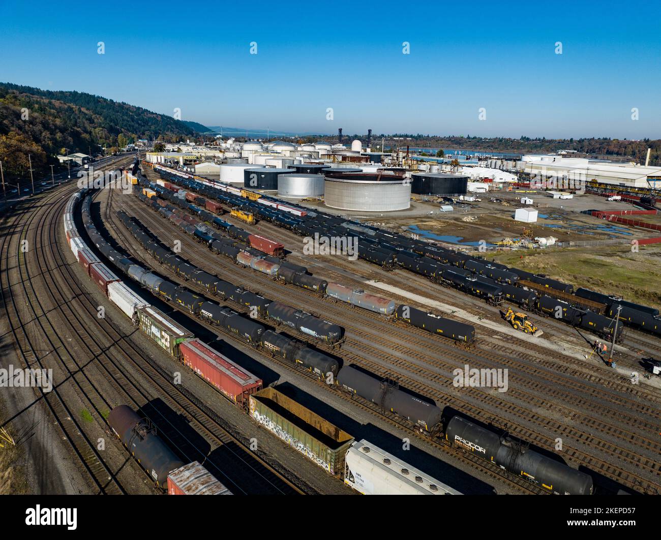 Petroleum and chemical tank farms along a busy rail yard on the ...