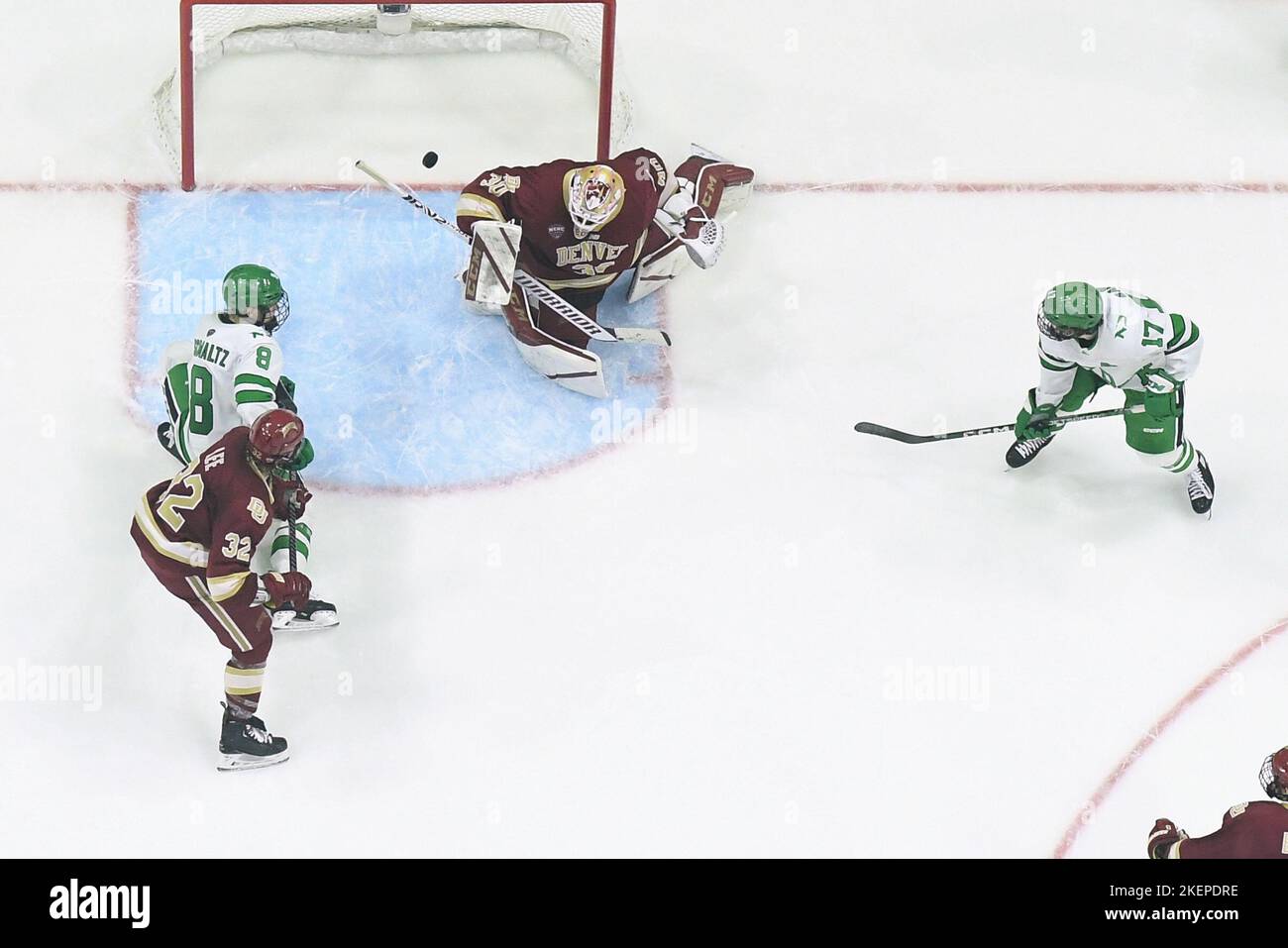 North Dakota Fighting Hawks forward Jake Schmaltz (8) and North Dakota Fighting Hawks forward ...
