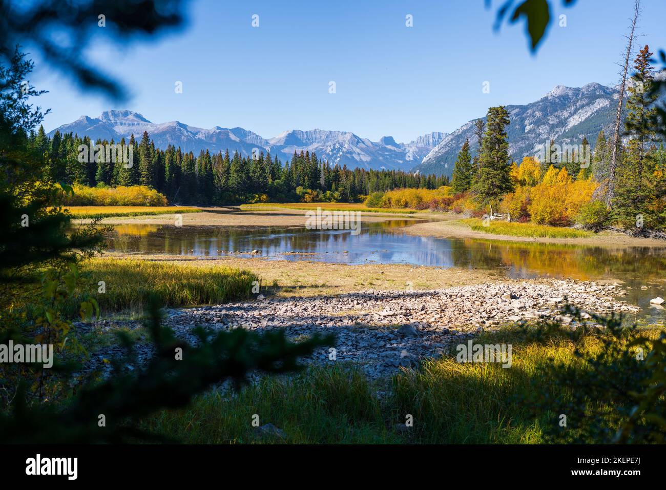 two rivers meeting in front of mountains Stock Photo - Alamy