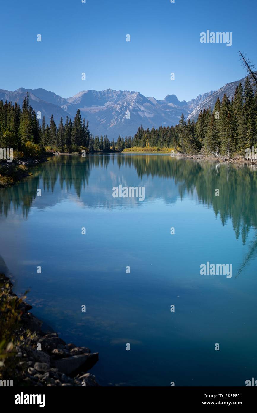 mountain reflection over the bow river in banff national park Stock ...