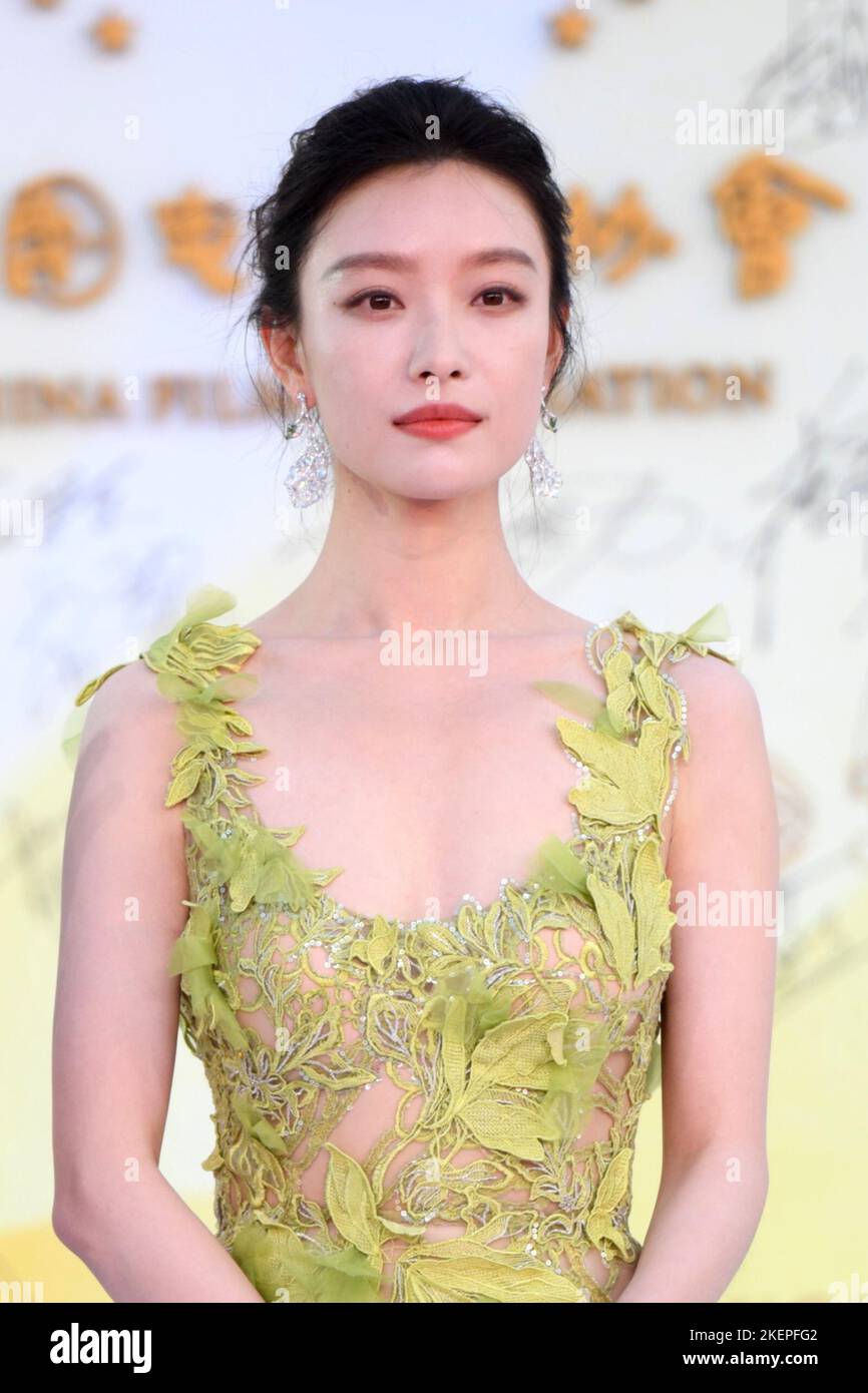 Chinese actress Ni Ni shows on the red carpet of the 35th Golden ...