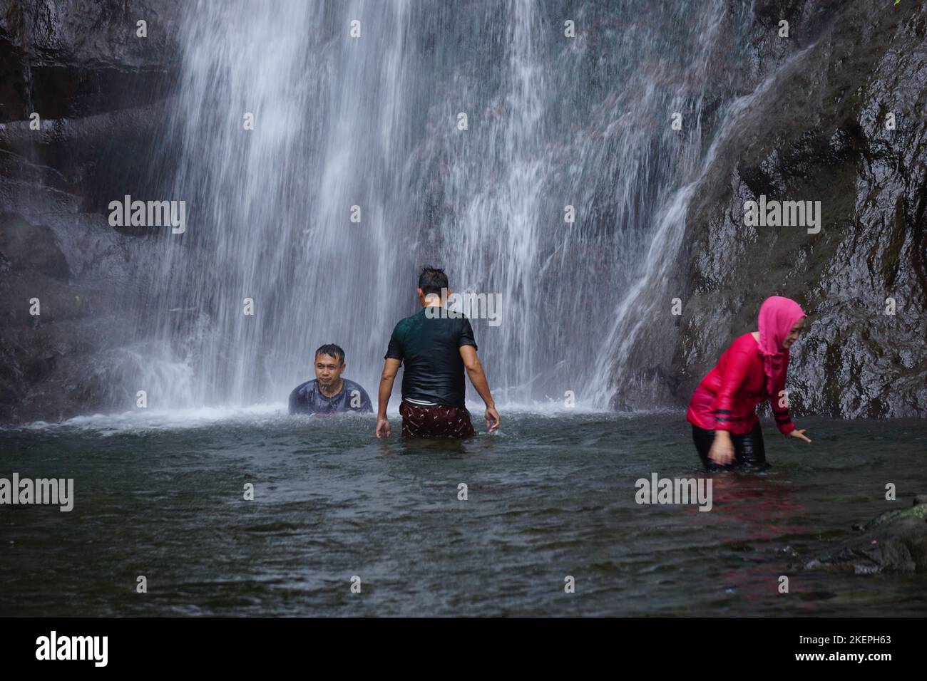 Siraman sedudo ceremony in sedudo waterfall. Siraman sedudo is taking a ...