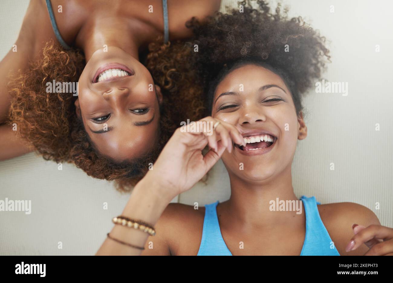 Laughing all the way to a healthy lifestyle. High angle shot of two ...