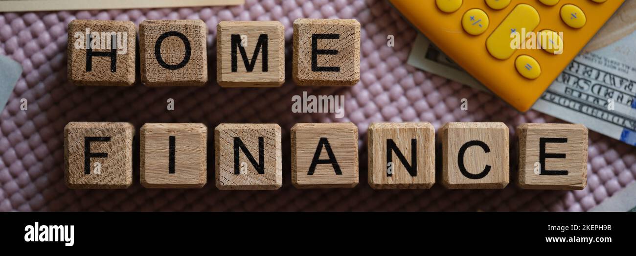Text home finance calculator and cash on table Stock Photo - Alamy