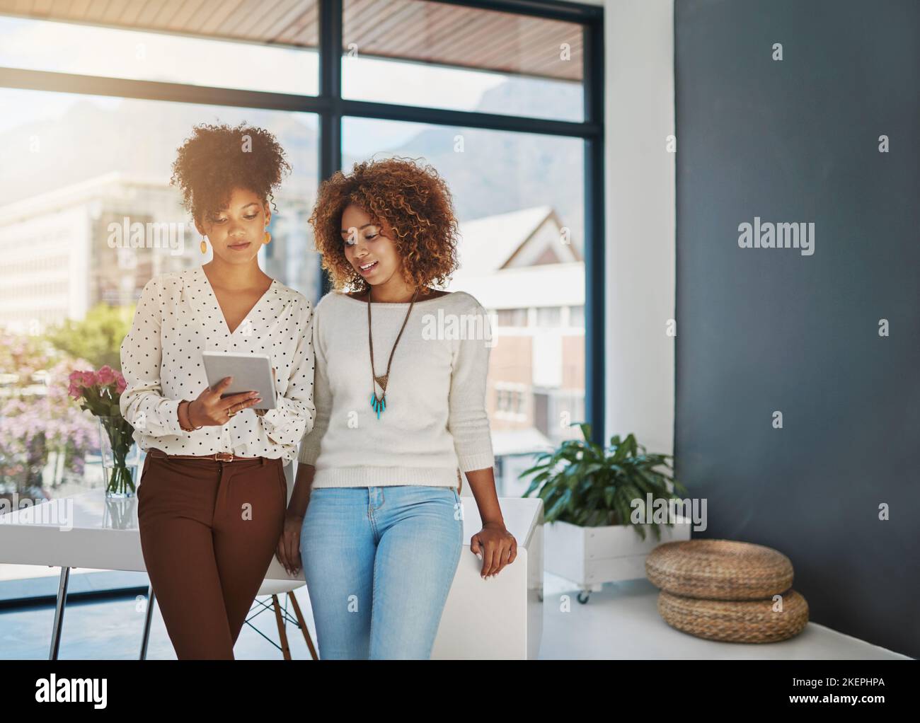 Designers of success. creative employees working in a office Stock ...