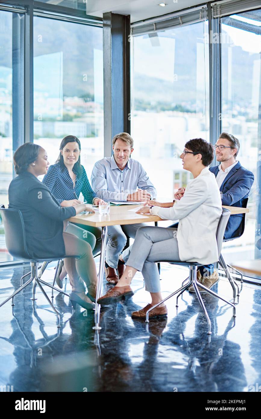 Strategy session in progress. a group of businesspeople having a ...