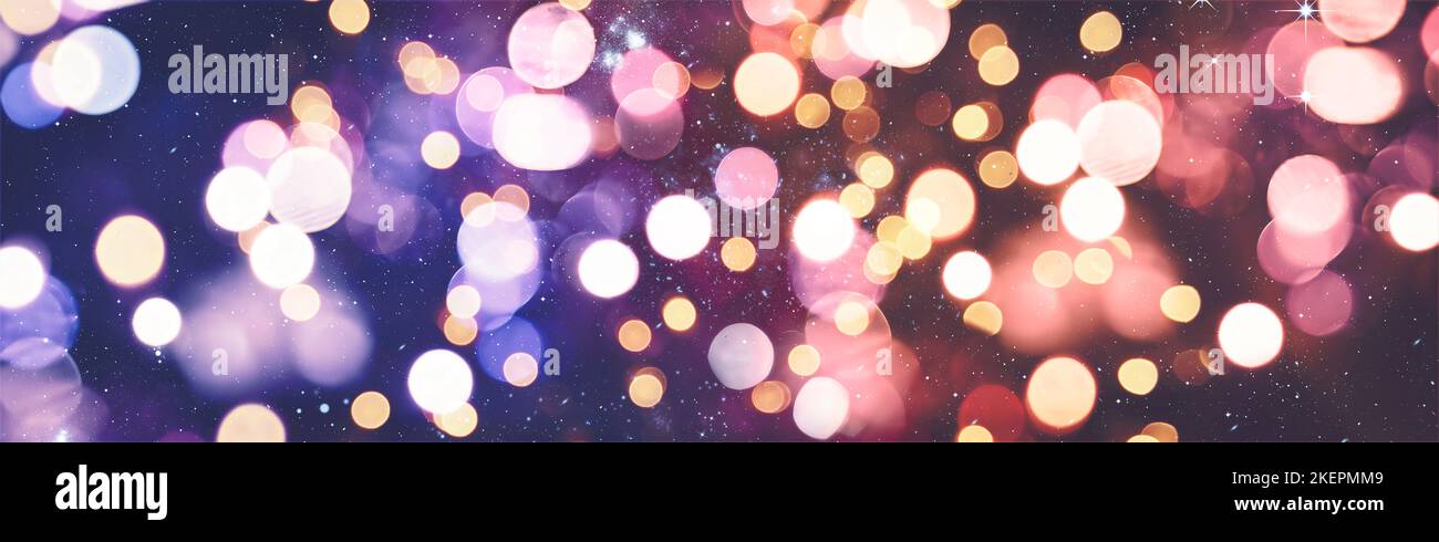 Abstract light celebration background with defocused golden lights for ...