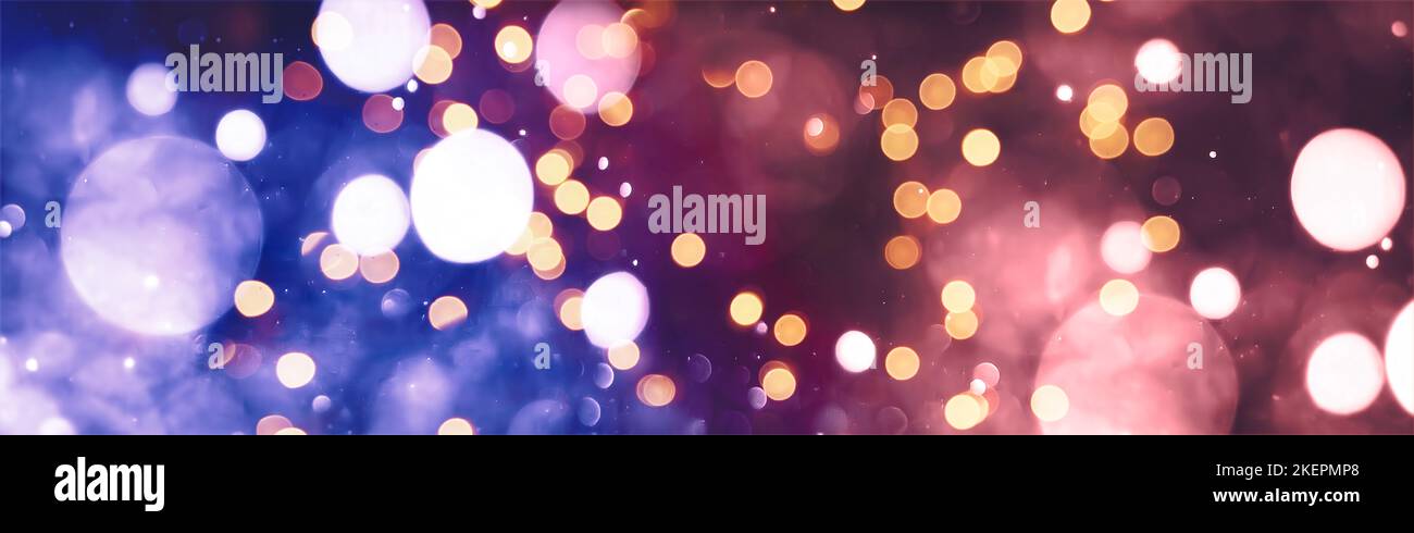 Abstract light celebration background with defocused golden lights for ...
