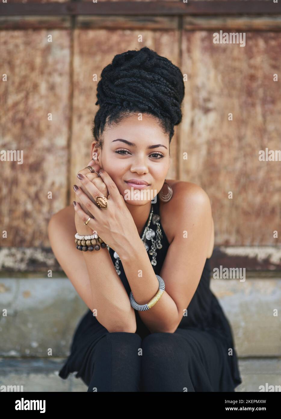 Style is a personal choice. Portrait of an attractive young woman posing outdoors Stock Photo ...