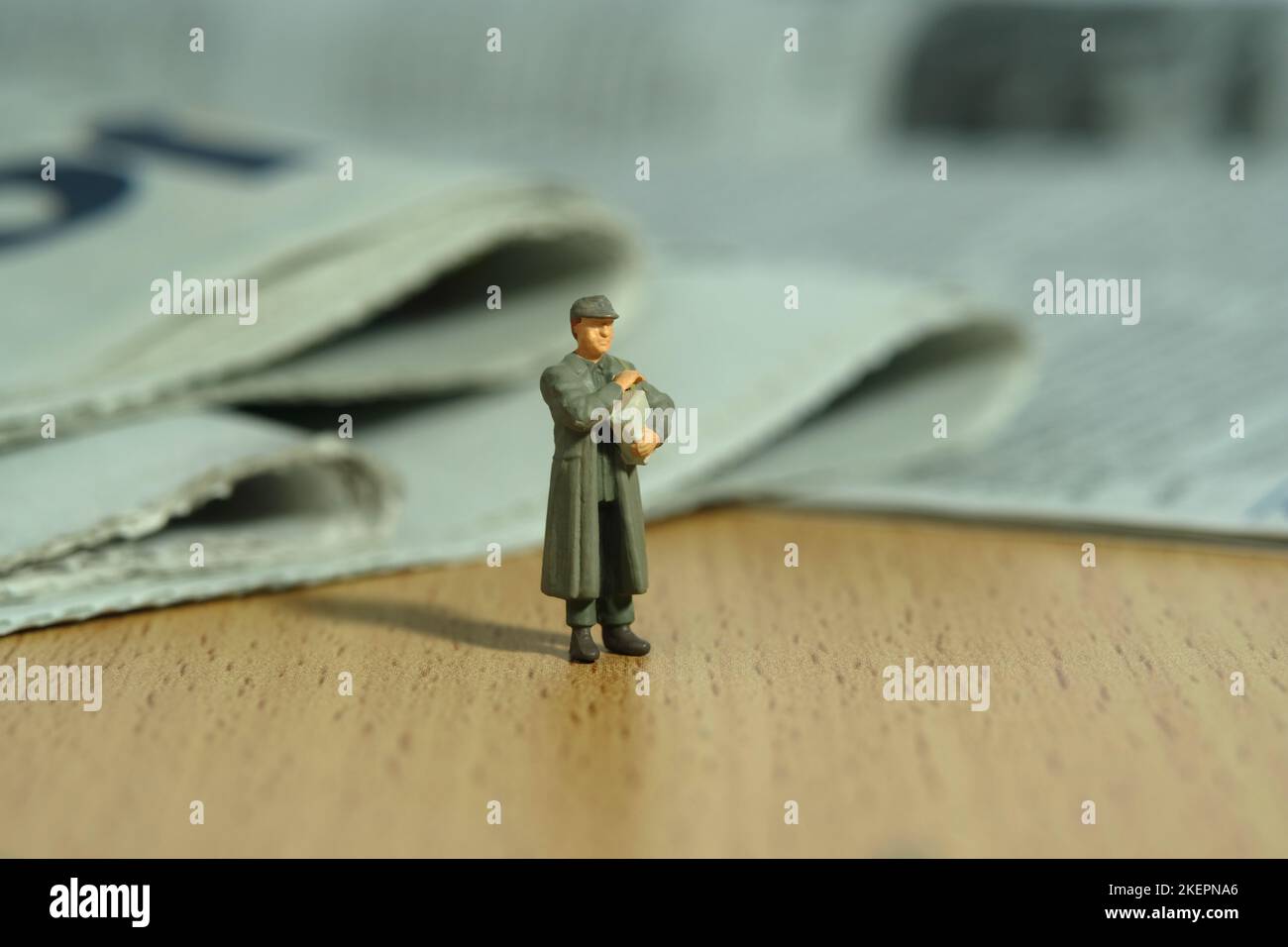 Miniature people toy figure photography. A military mail officer ...