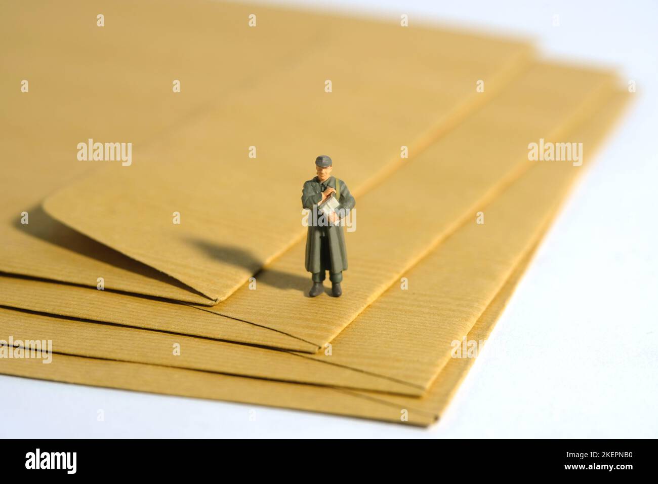 Miniature people toy figure photography. A military mail officer ...