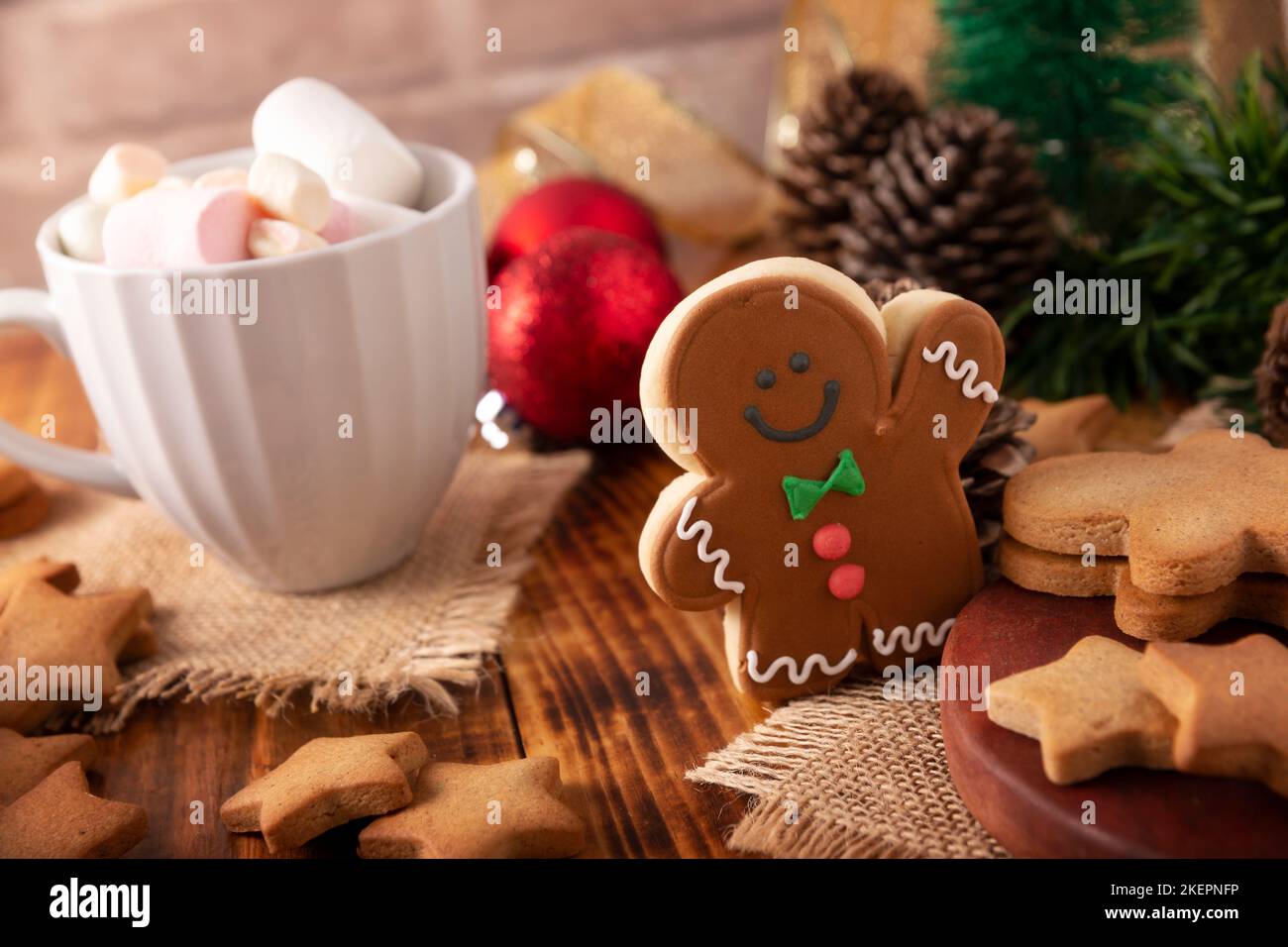 Christmas Homemade gingerbread man cookie and white cup with hot ...
