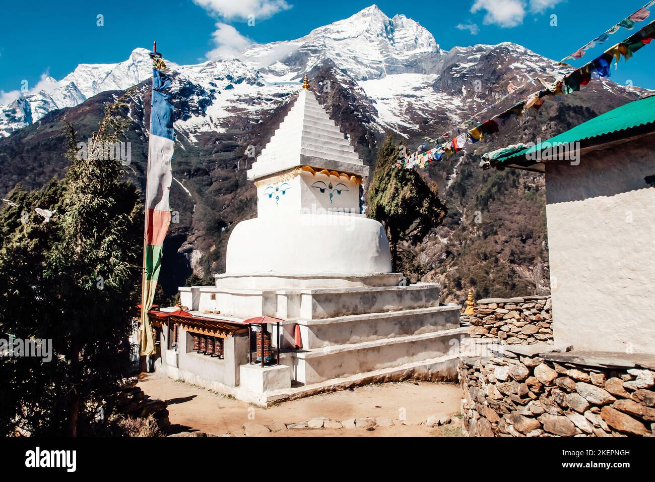 Beautiful traditional white stone Stupa with Budda eyes in Himalayas ...
