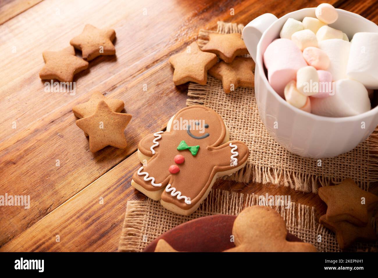 Christmas Homemade gingerbread man cookie and white cup with hot ...