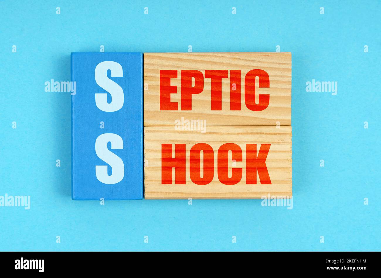 Medicine concept. On a blue background, wooden plaques with the ...