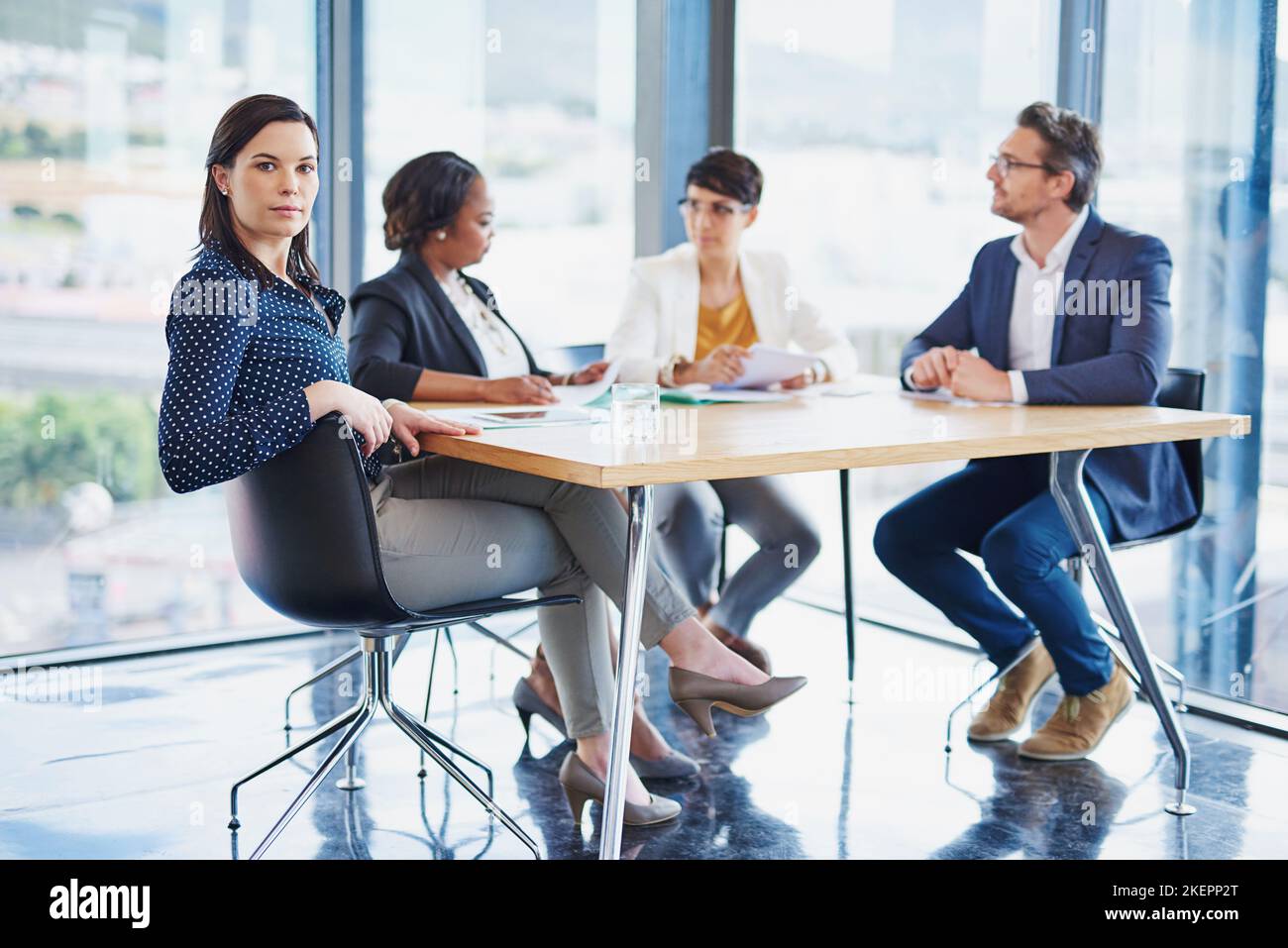 Success is a serious business. Portrait of a team of colleagues having ...