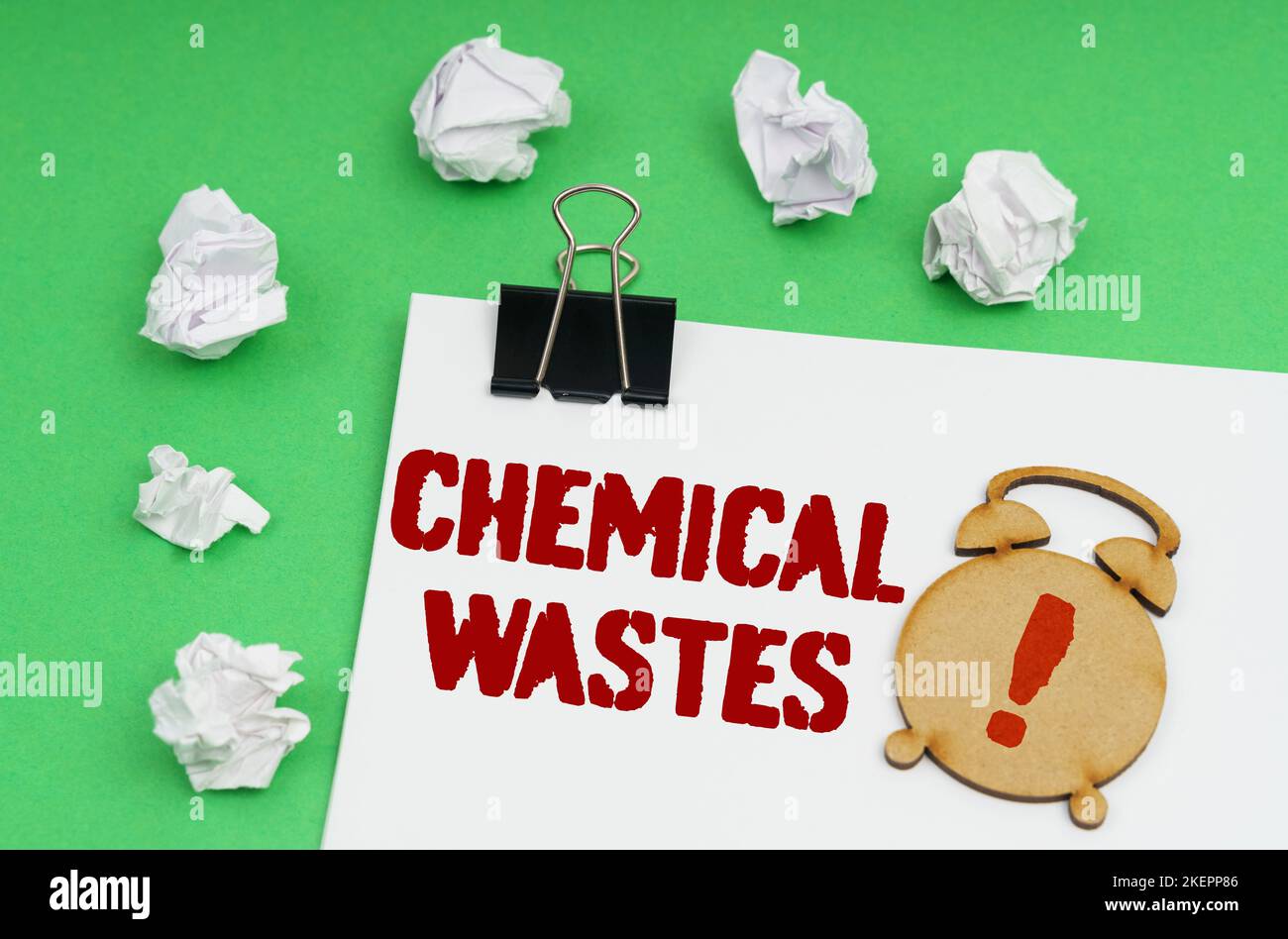 Environmental concept. On a green background there is a white sheet, on ...