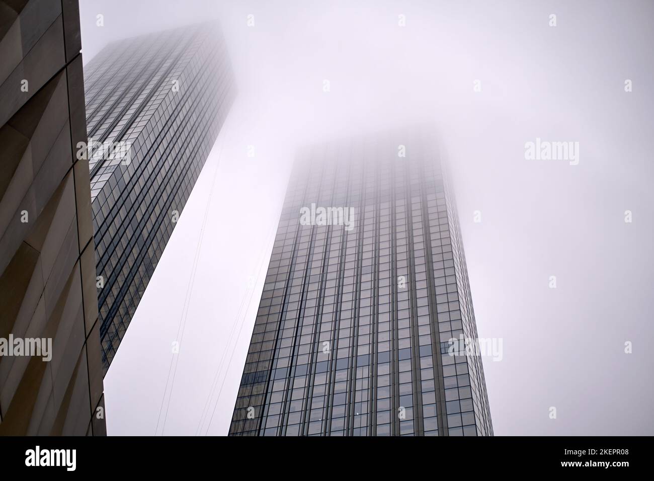 Windows of skyscrapers in the fog, background copy space. Metal ...
