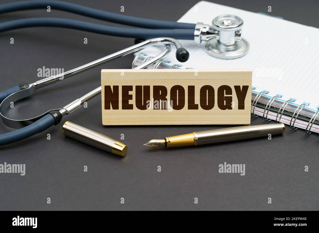 Medicine concept. On the table is a notebook, a stethoscope and a sign ...