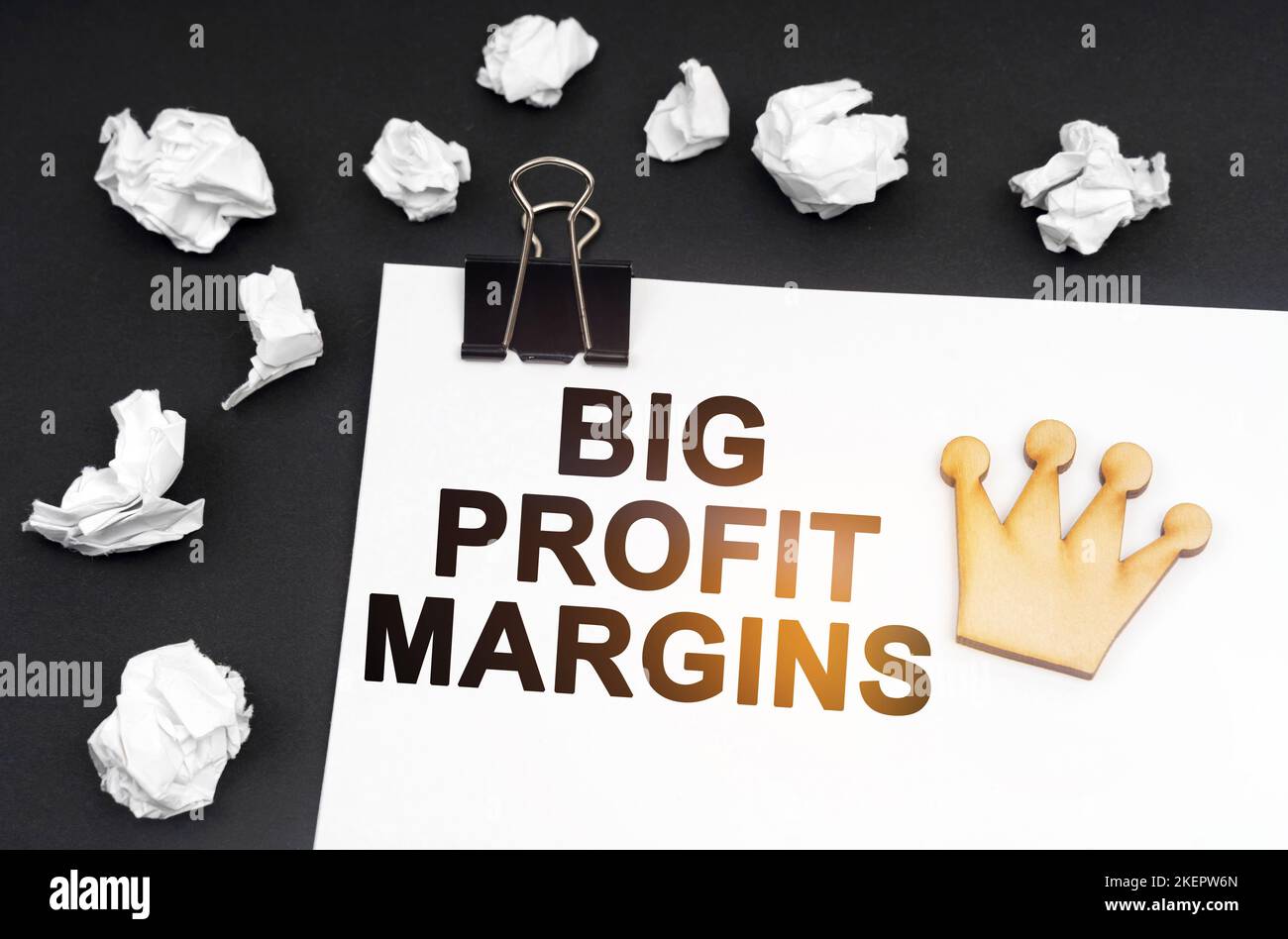 Business and finance concept. On a black background, crumpled paper and ...