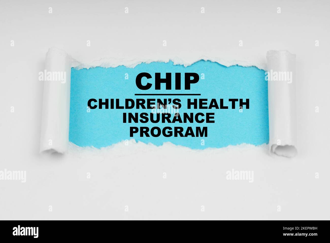 Medical concept. In the middle of a white sheet in space on a blue ...