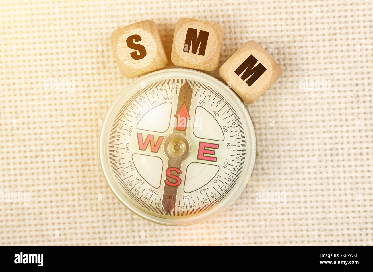 Business concept. On the table is a compass and cubes with the ...