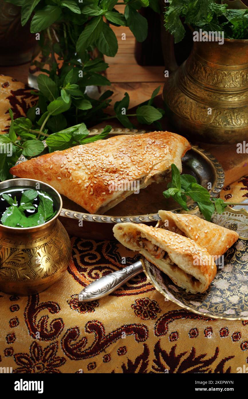 Traditional oriental dish samsa Stock Photo - Alamy