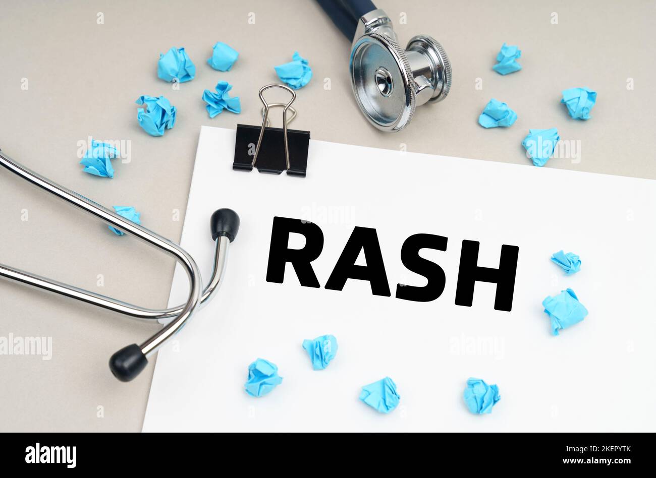 Medicine concept. On the table is a stethoscope, a pen, blue crumpled ...