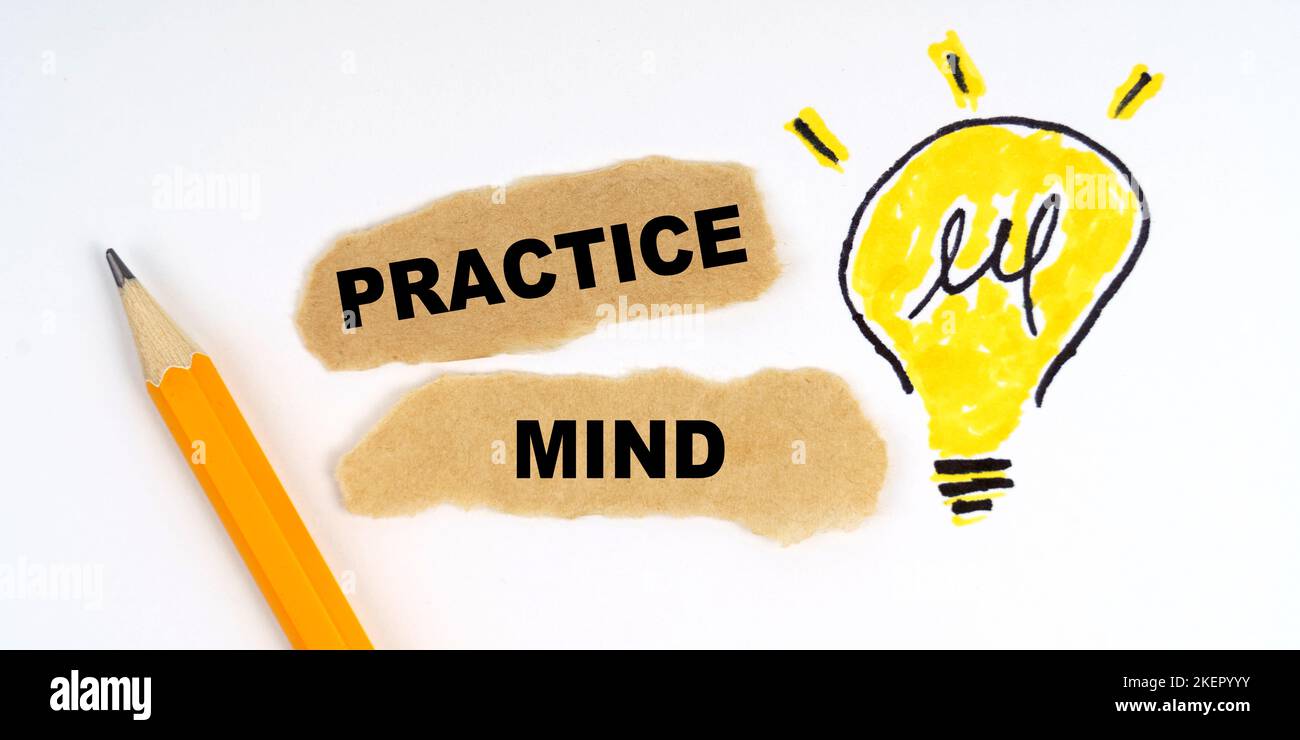 Business and finance concept. A lamp is drawn on a white sheet, there ...