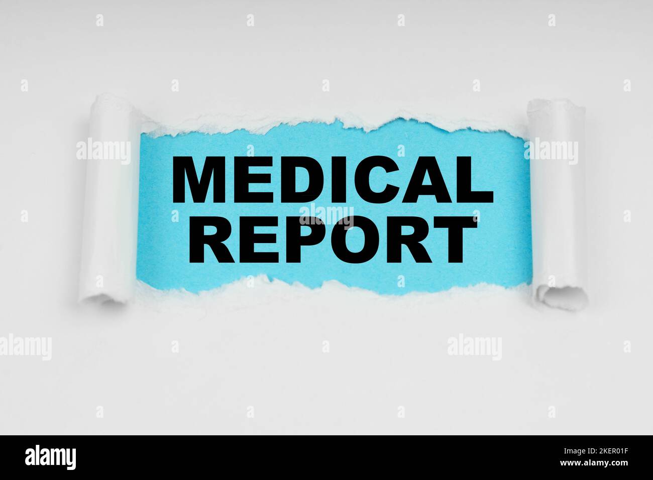 Medical concept. In the middle of a white sheet in space on a blue ...