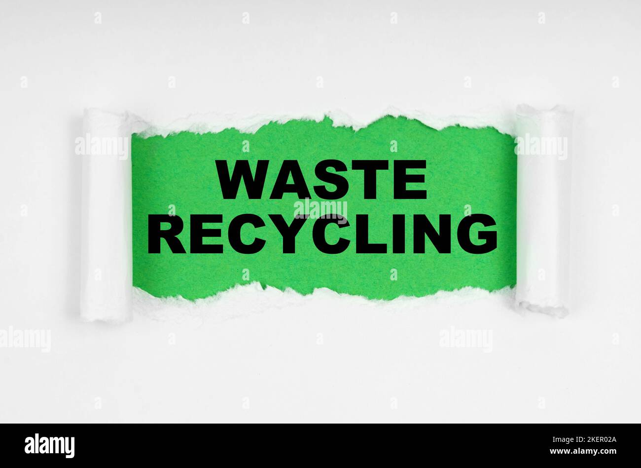 Environmental concept. In the middle of the white sheet, the paper is ...