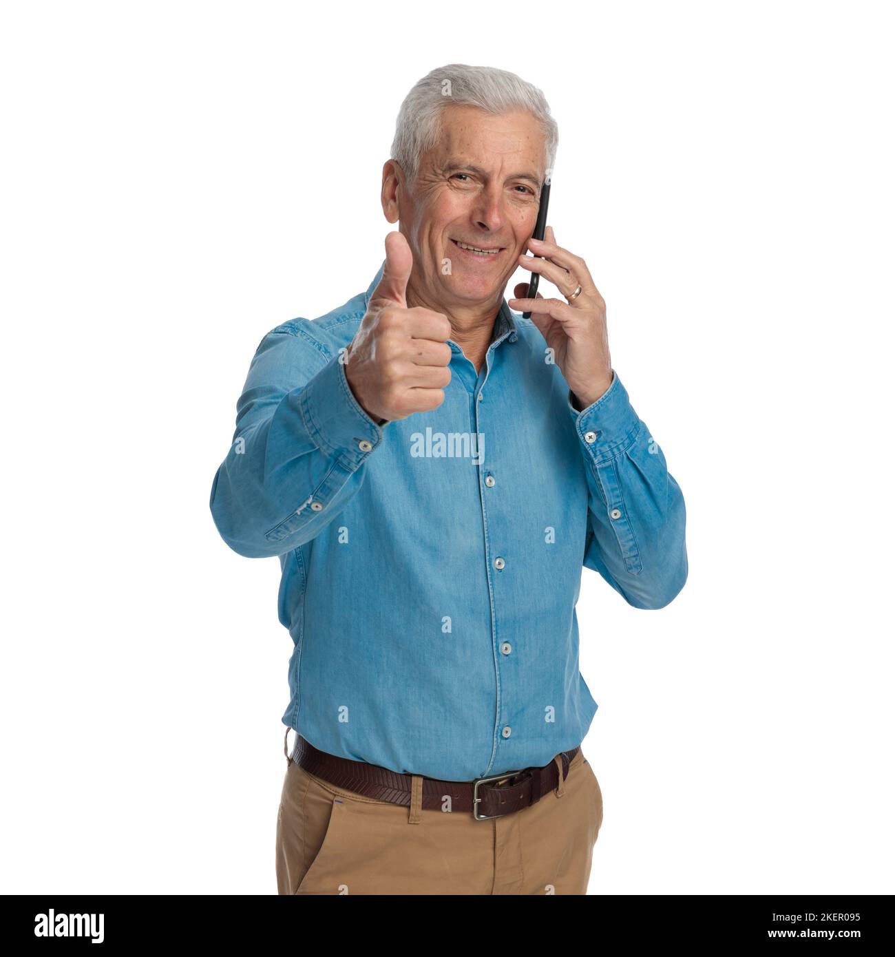 Old happy man holding thumbs hi-res stock photography and images - Alamy