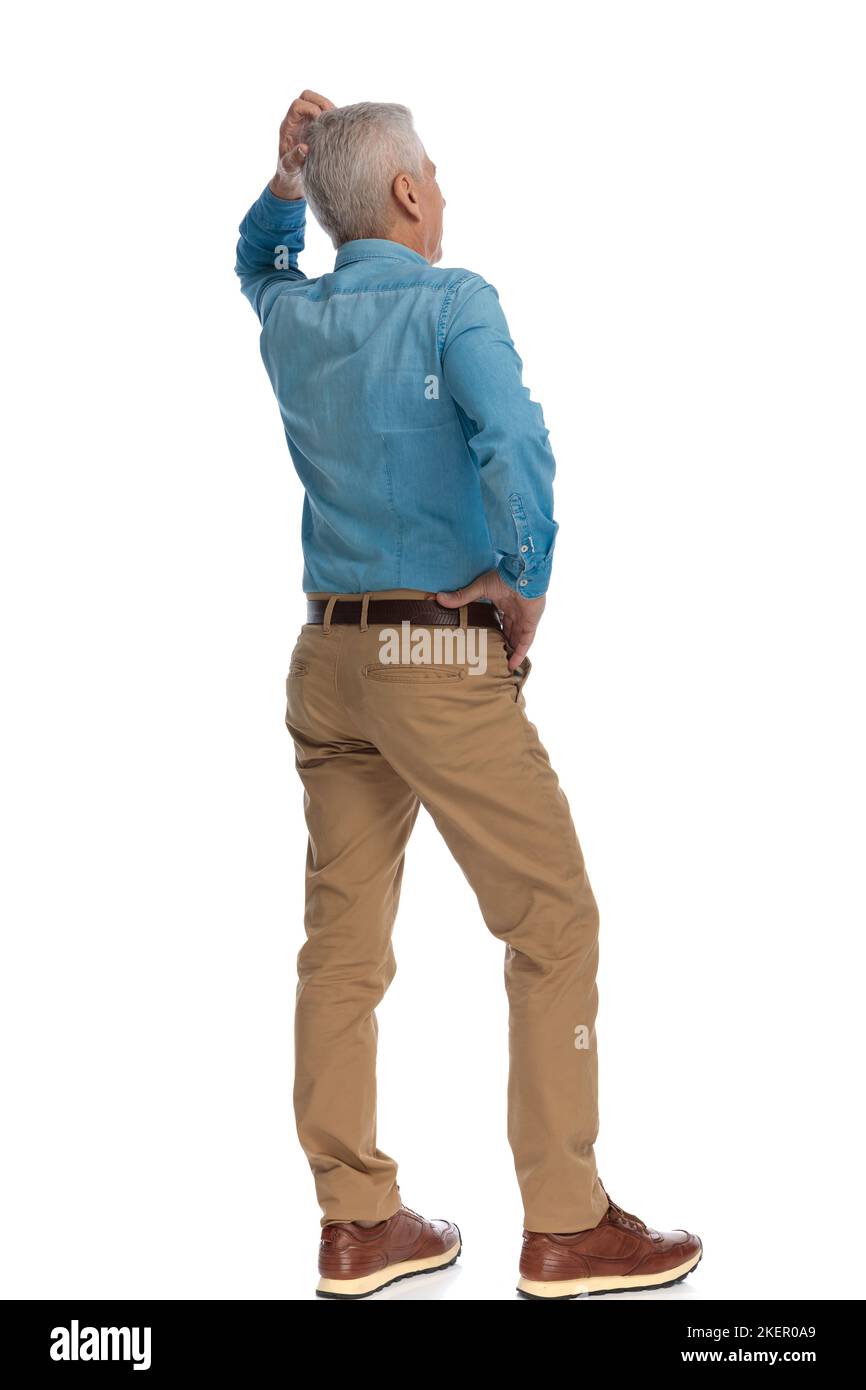 old man with grey hair scratching head, being confused and thinking of ...