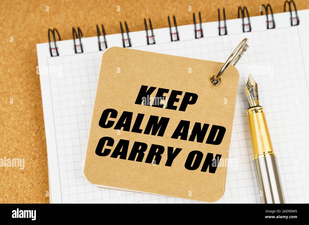 Business and economy concept. There are two notebooks and a pen on the ...