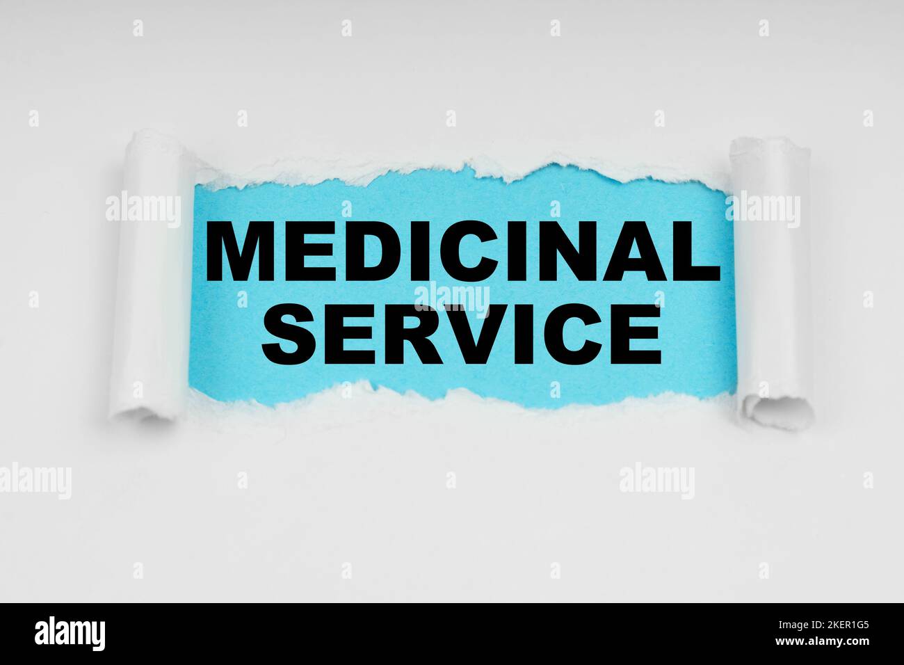 Medical concept. In the middle of a white sheet in space on a blue ...