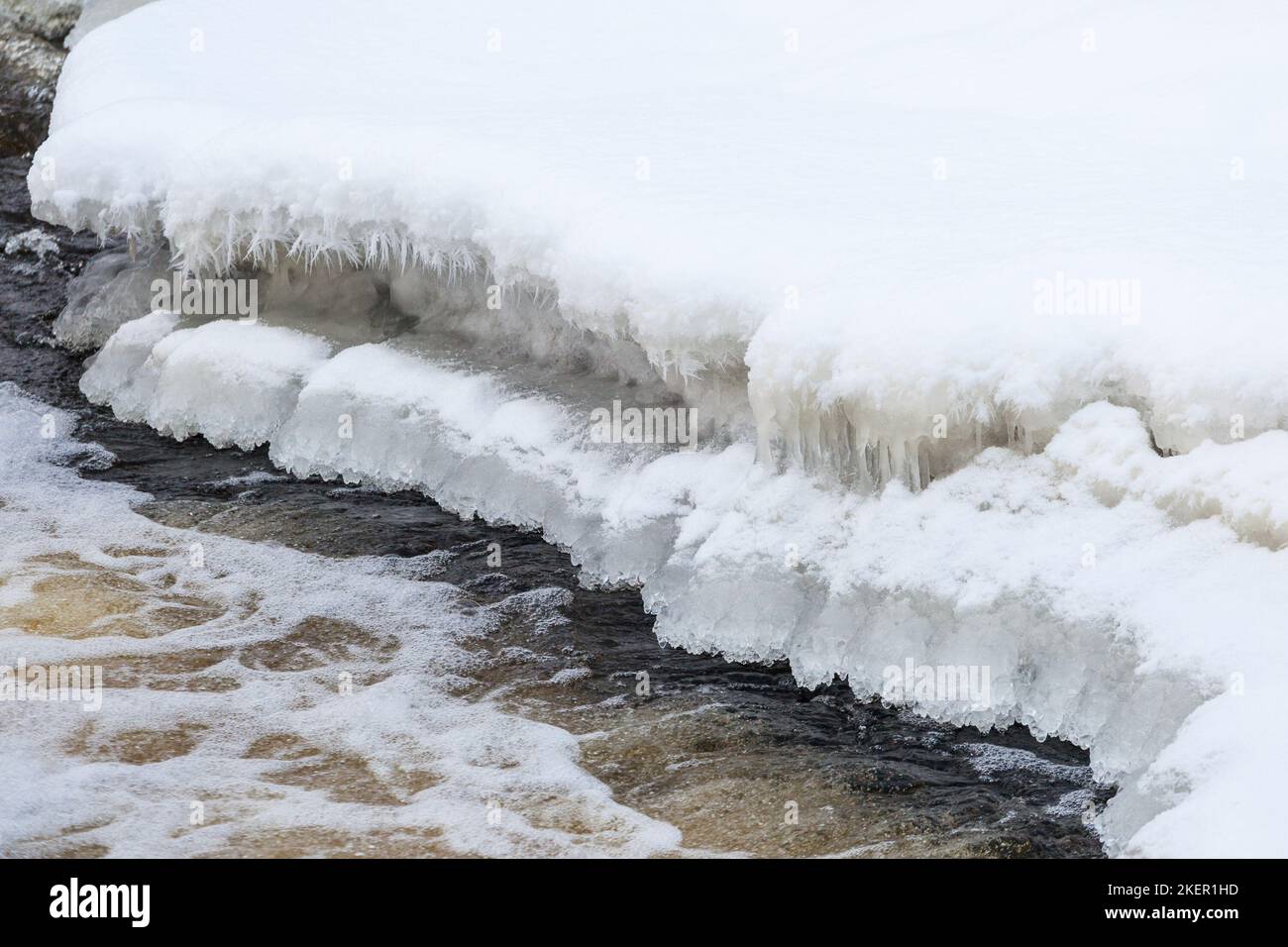 Frozen river covered snow in hi-res stock photography and images - Alamy