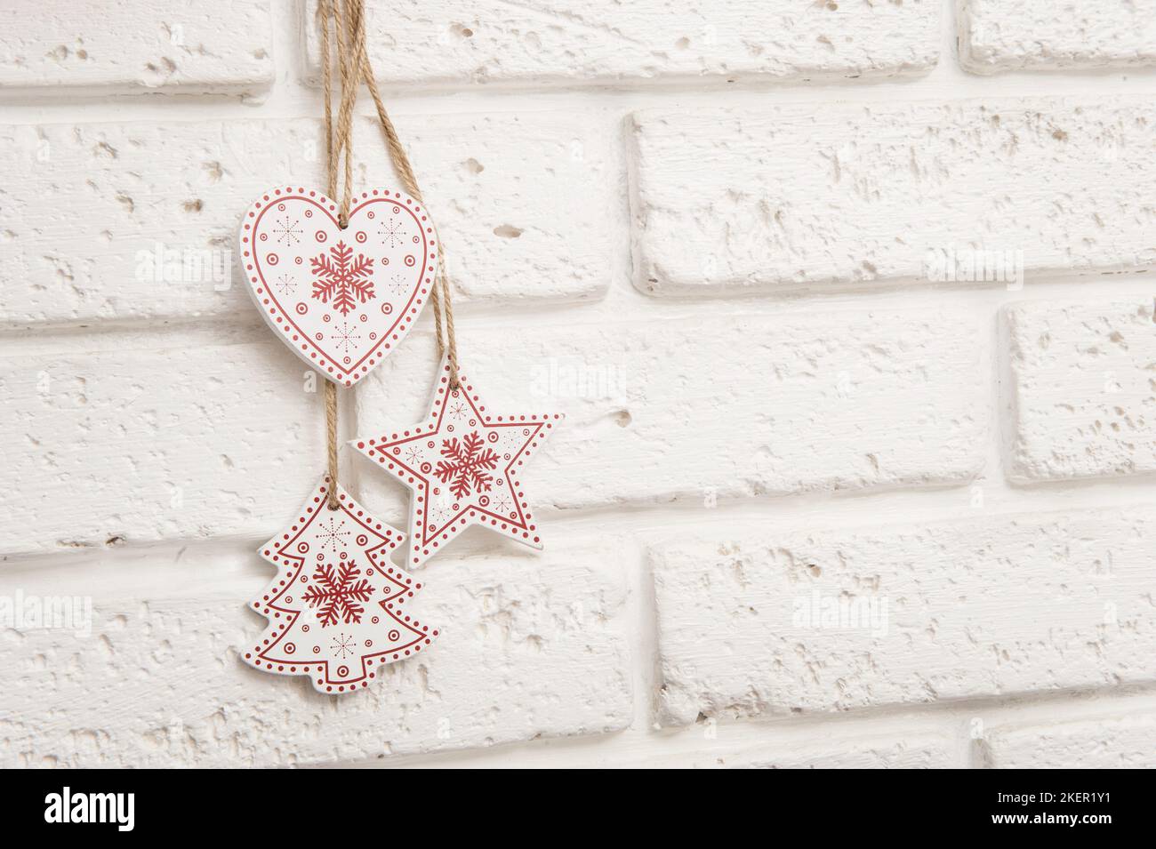 wooden Christmas decorations on a brick background Stock Photo - Alamy
