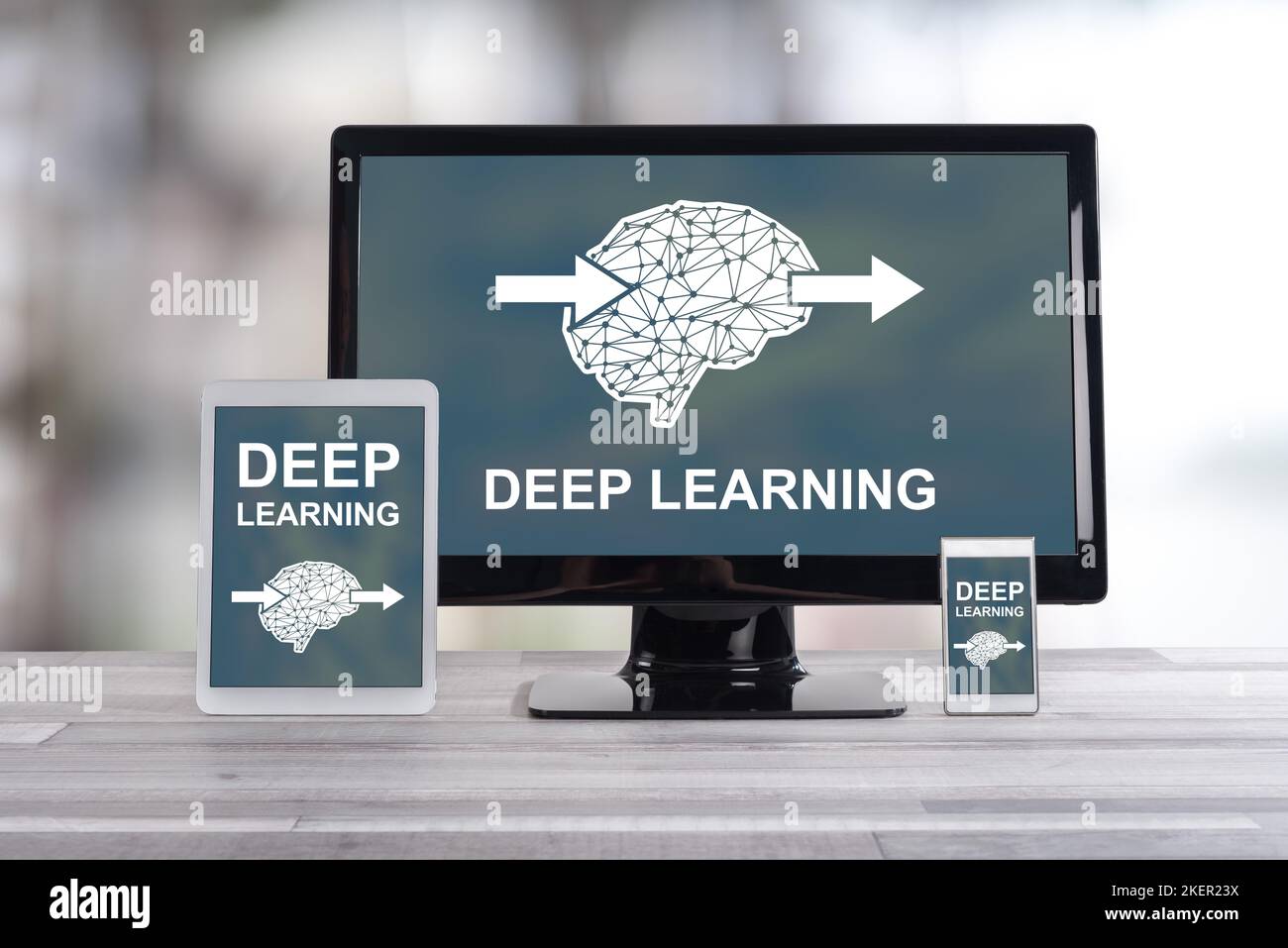 Deep learning concept shown on different information technology devices ...