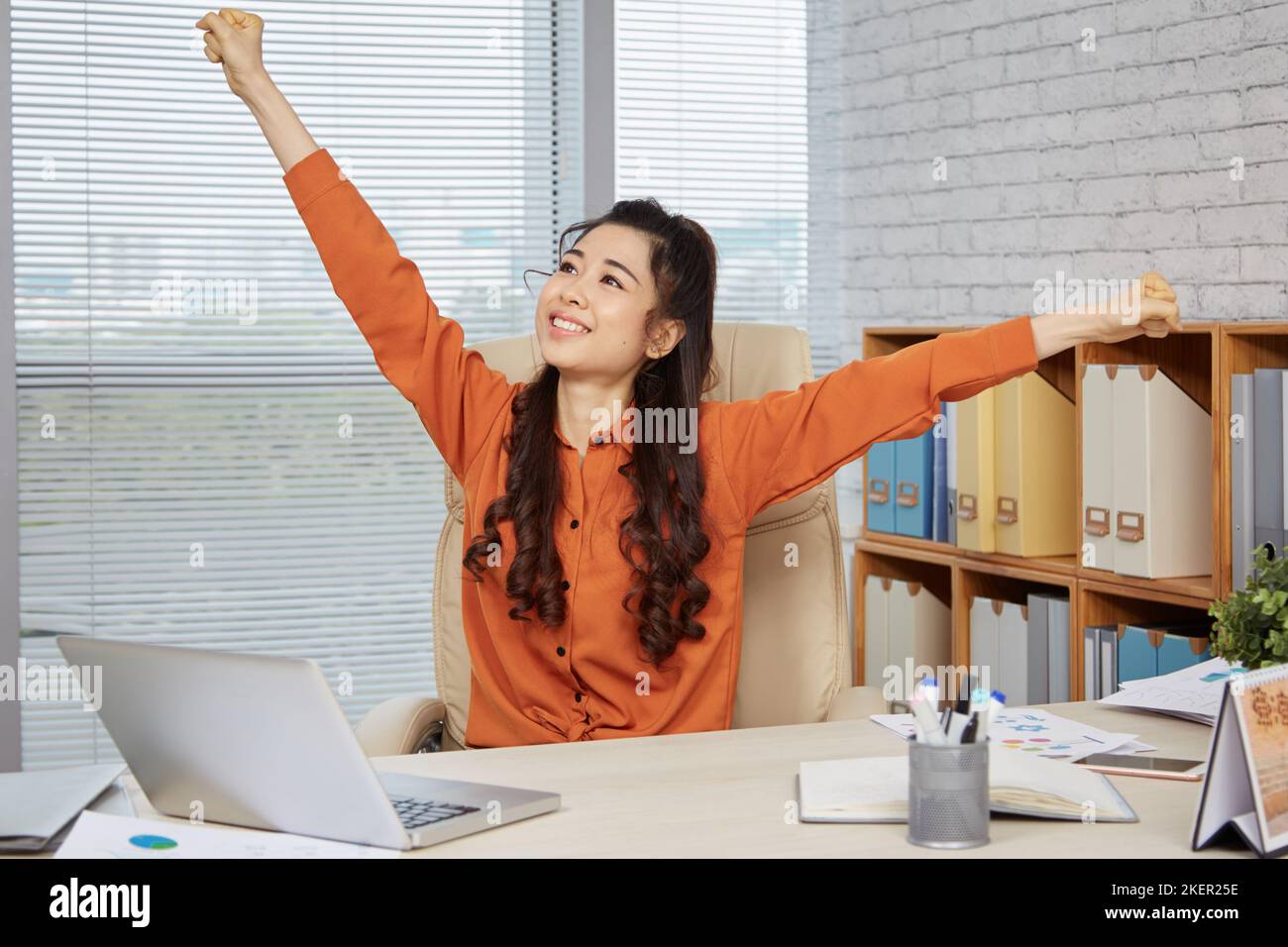 Happy excited young business woman celebrating first achievement Stock ...