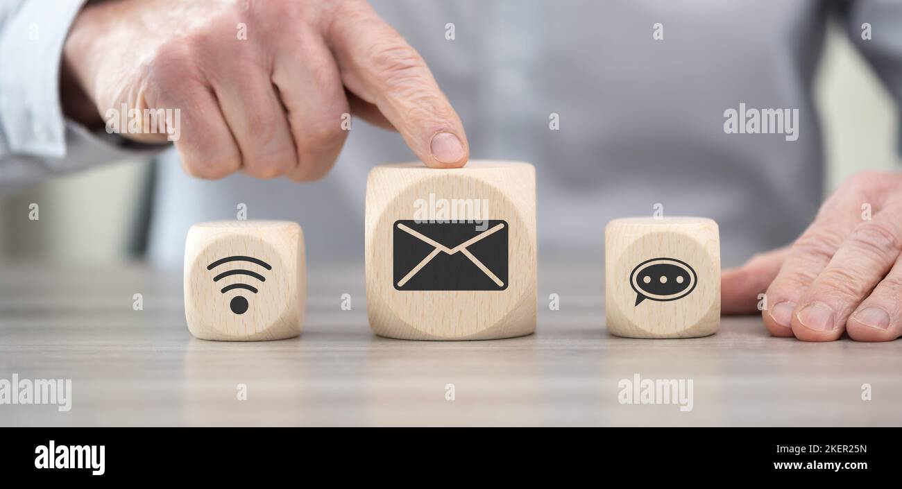 Wooden blocks with symbol of email sending concept Stock Photo - Alamy