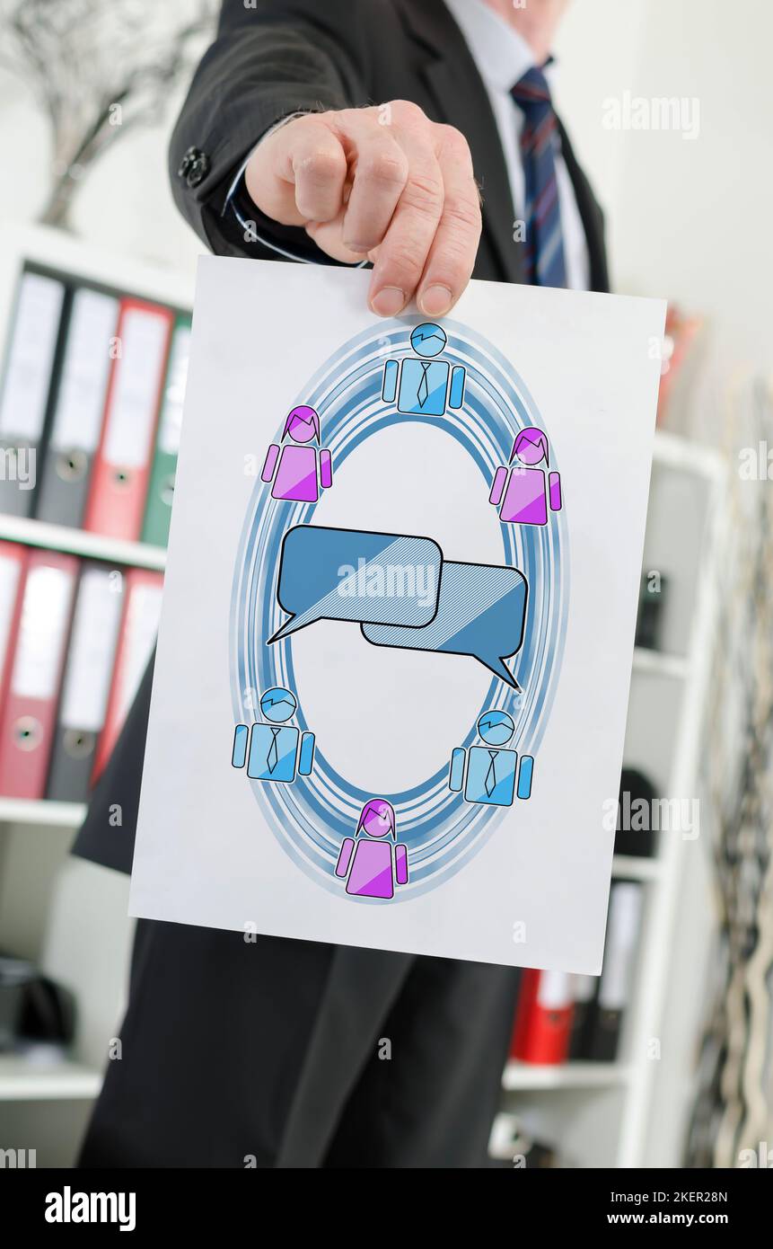 Paper showing business communication concept held by a businessman ...