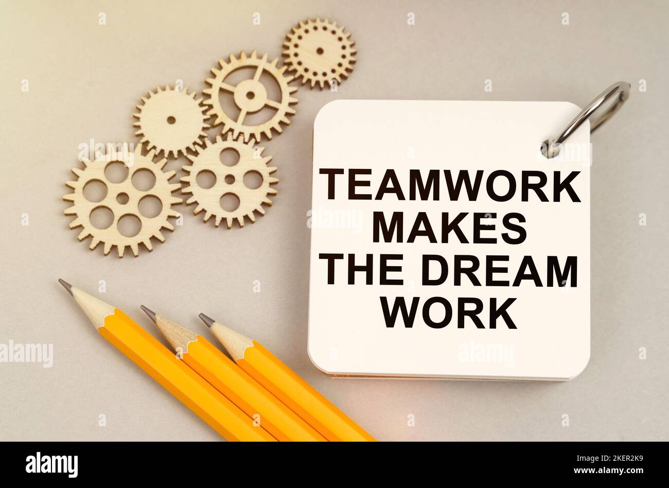 Business and finance concept. On the table are gears, pencils and a ...