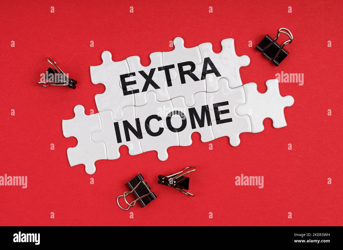 Business and Economics. On a red background, there are puzzles with the ...