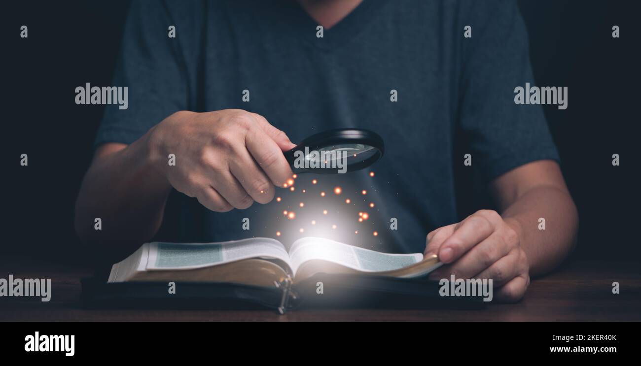 Man reading and search Holy Bible teaching spiritual word book with ...