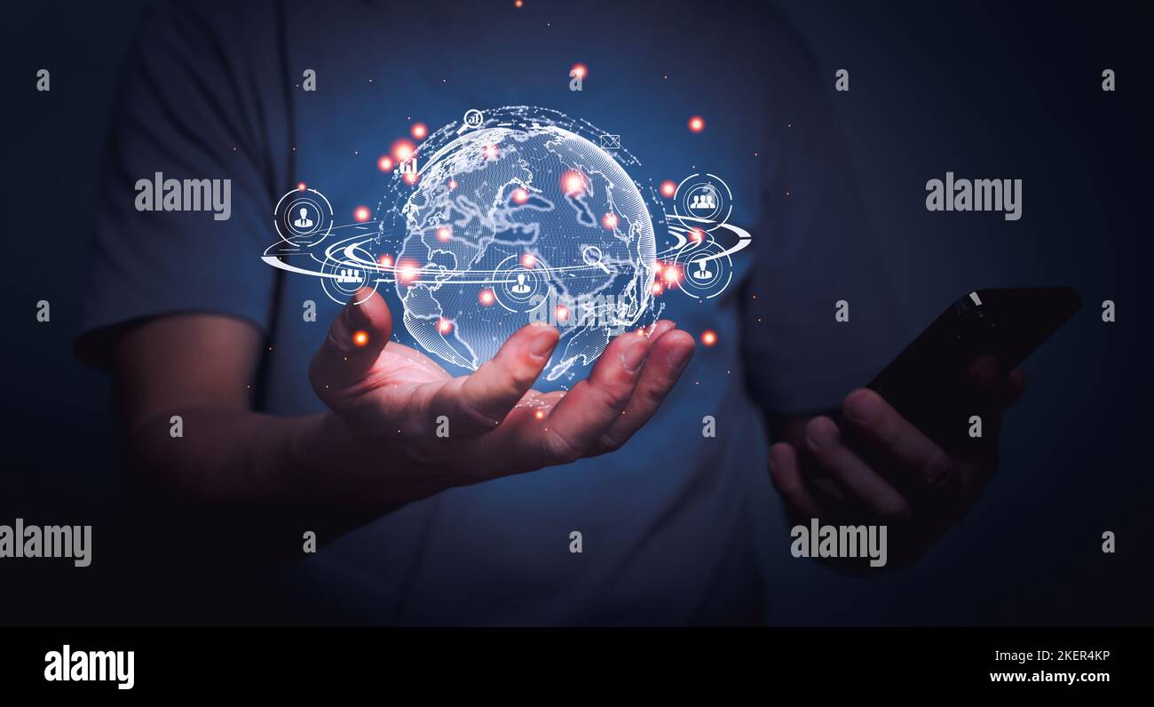 Man using mobile phone and holding globe with Global network ...