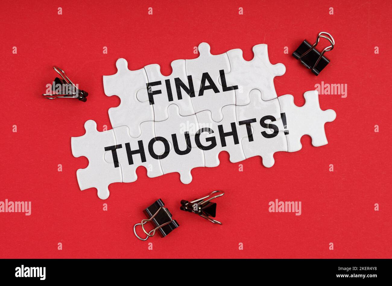 Business and Economics. On a red background, there are puzzles with the ...