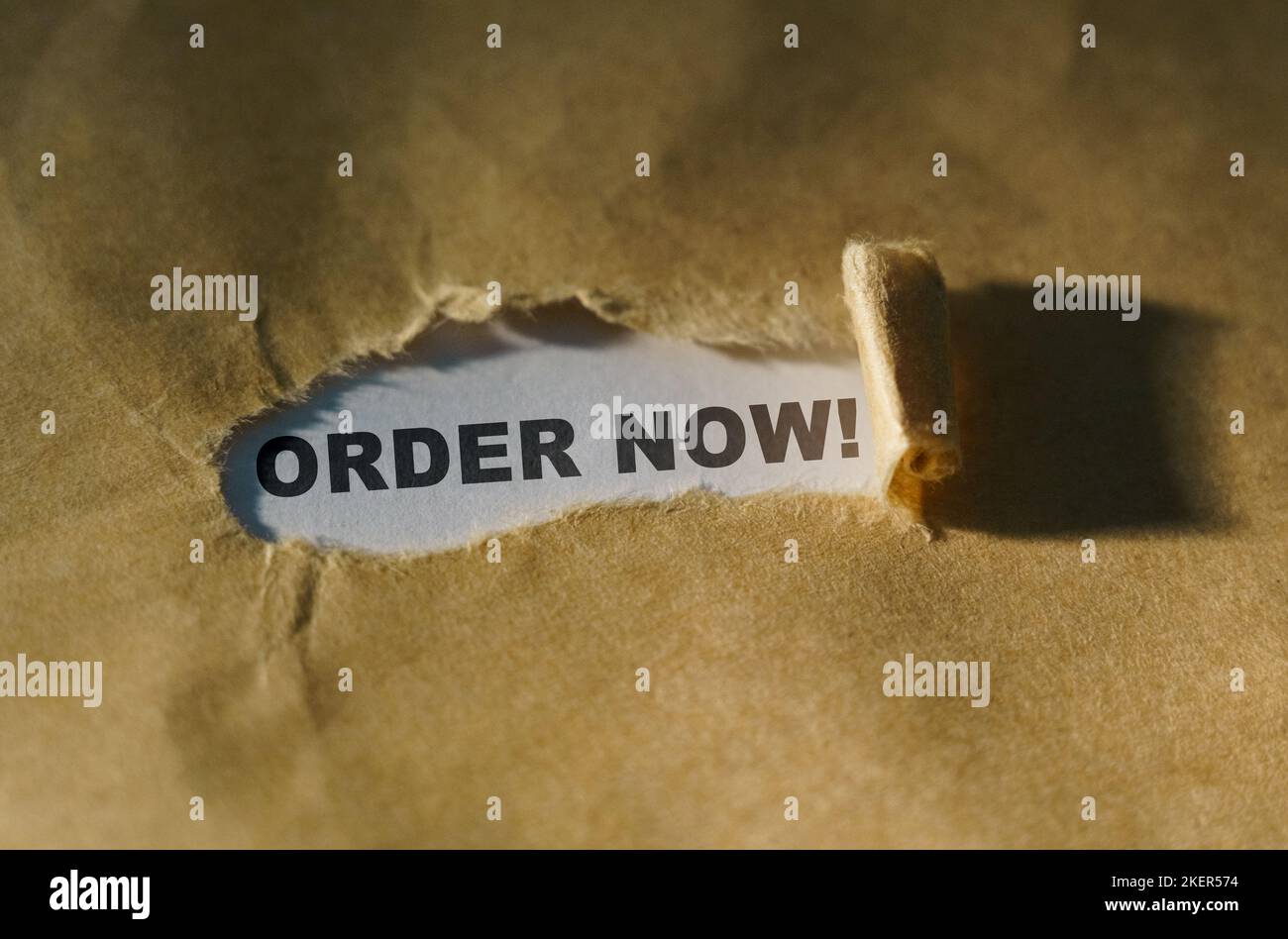 Economy and business concept. Torn paper in the middle of the sheet ...