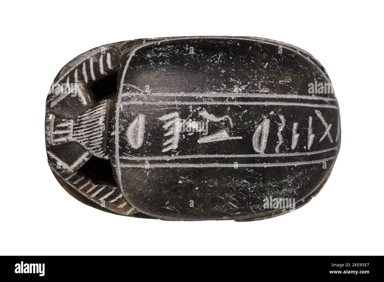 egyptian stone scarab with hieroglyphs isolated on white Stock Photo ...